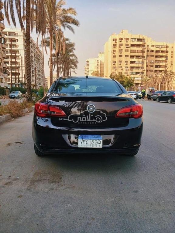 Astra Opel 2014 Heliopolis Dark red 7166813 - Car For Sale : Hatla2ee