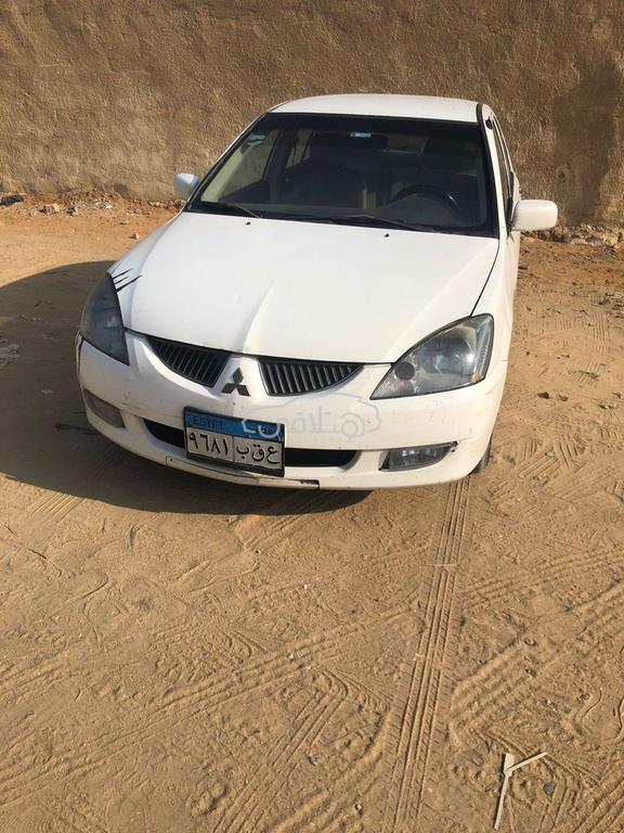 Lancer Puma Mitsubishi 2005 Tanta White 7169479 - Car For Sale : Hatla2ee